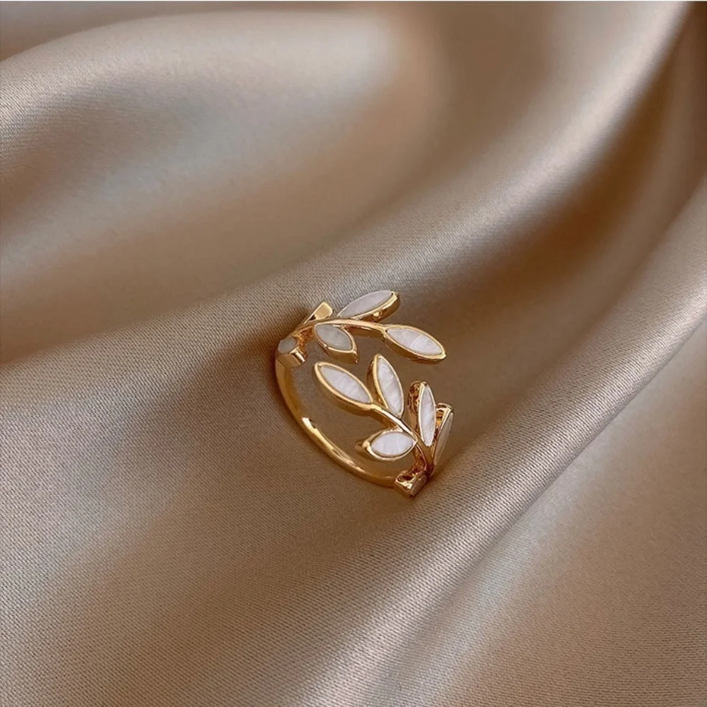 The Secret Pine | Jewelry | Besiana Gold X White Leaf Design Fashion ...